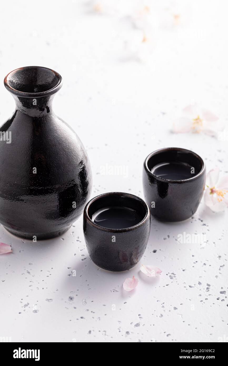 Strong sake in black ceramics. Japanese habit of drinking alcohol ...