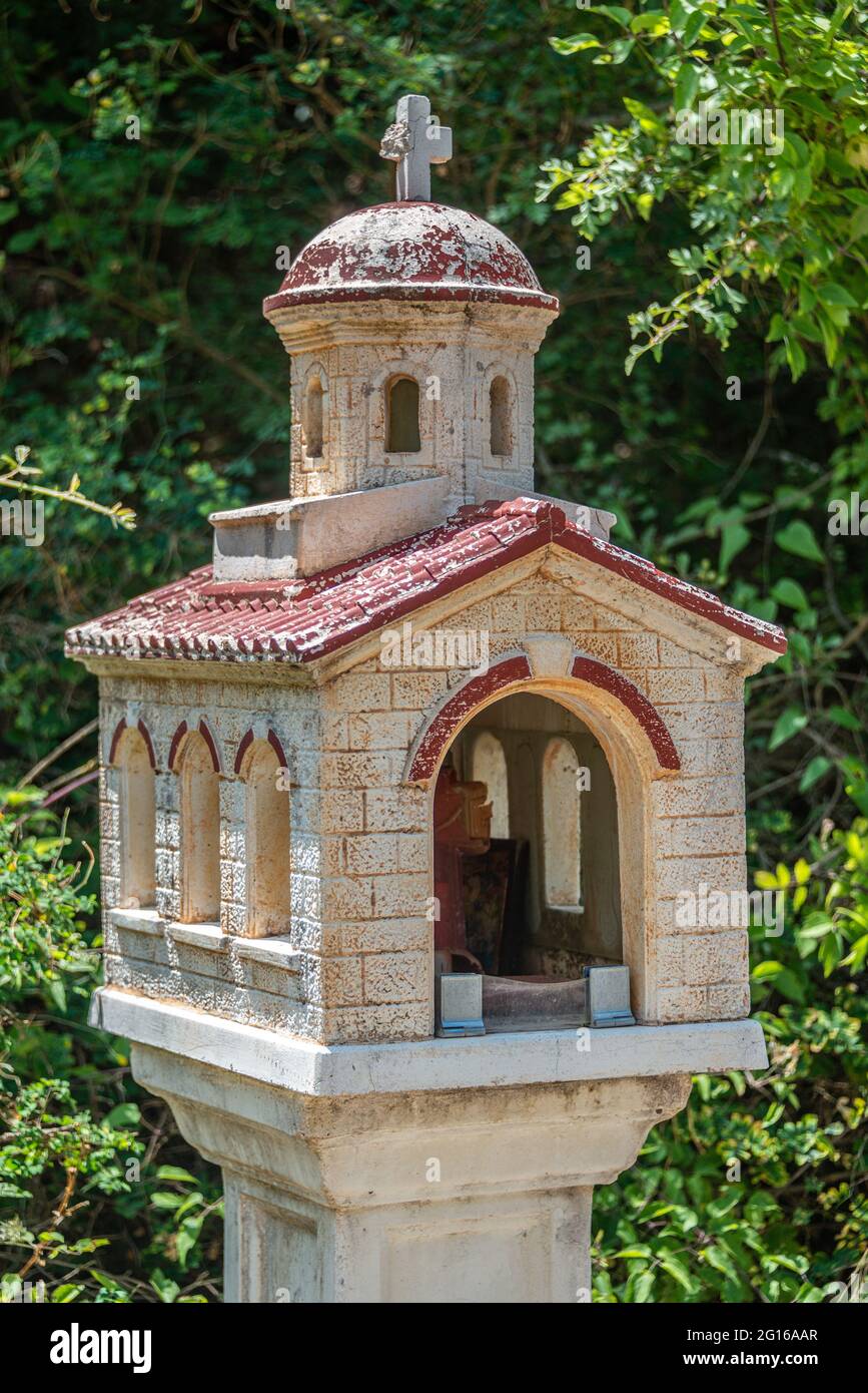 Kandylakia - typical greek miniature roadside shrine Stock Photo - Alamy