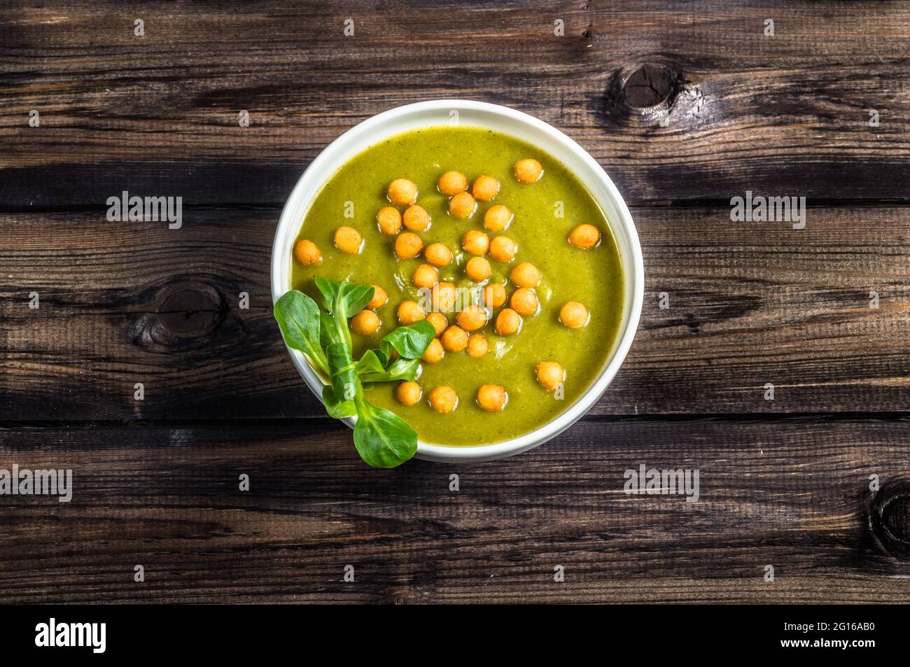 Broccoli soup, overhead in a bowl, homemade cooking concept Stock Photo ...