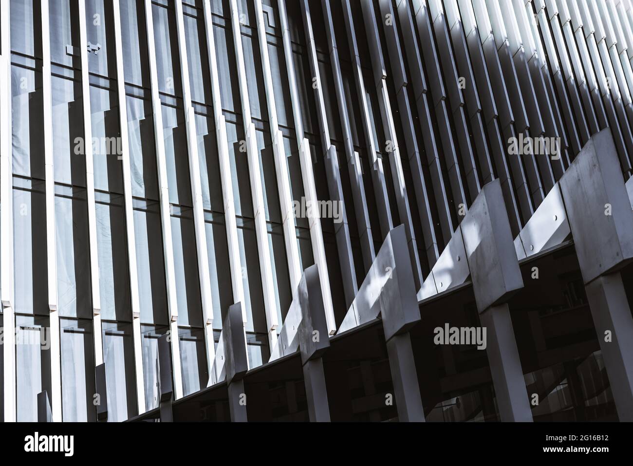 Side view of an abstract white contemporary business building facade ...
