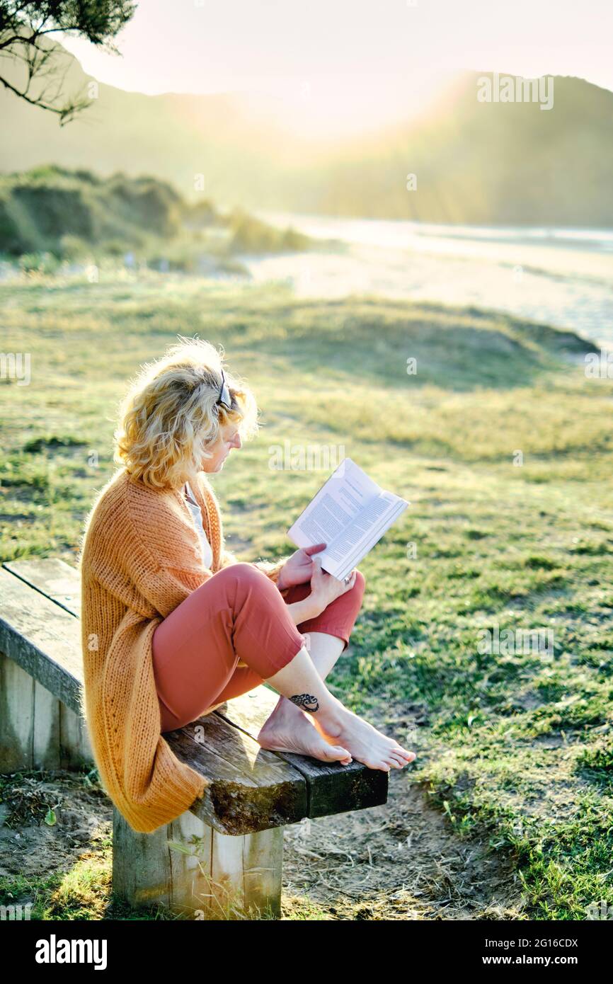 Woman Reading Outside