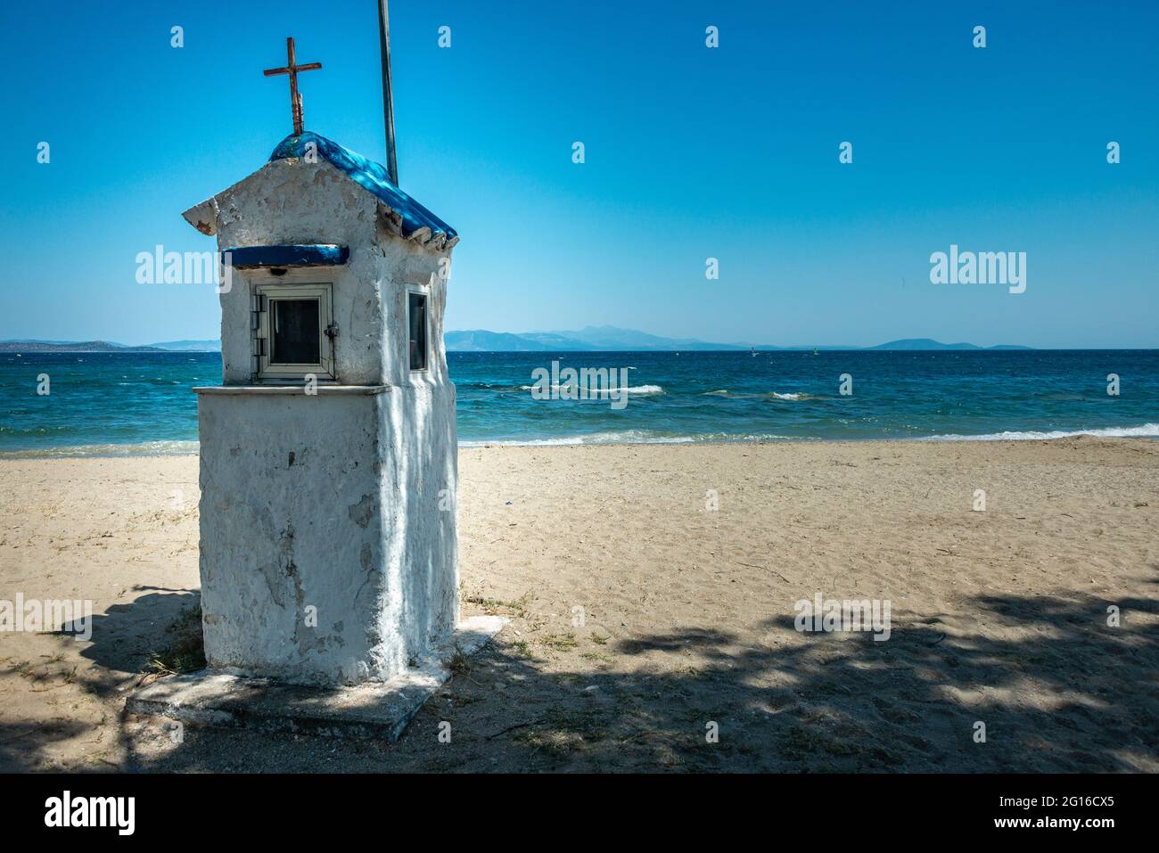 Kandylakia - typical greek miniature roadside shrine on the beach of ...