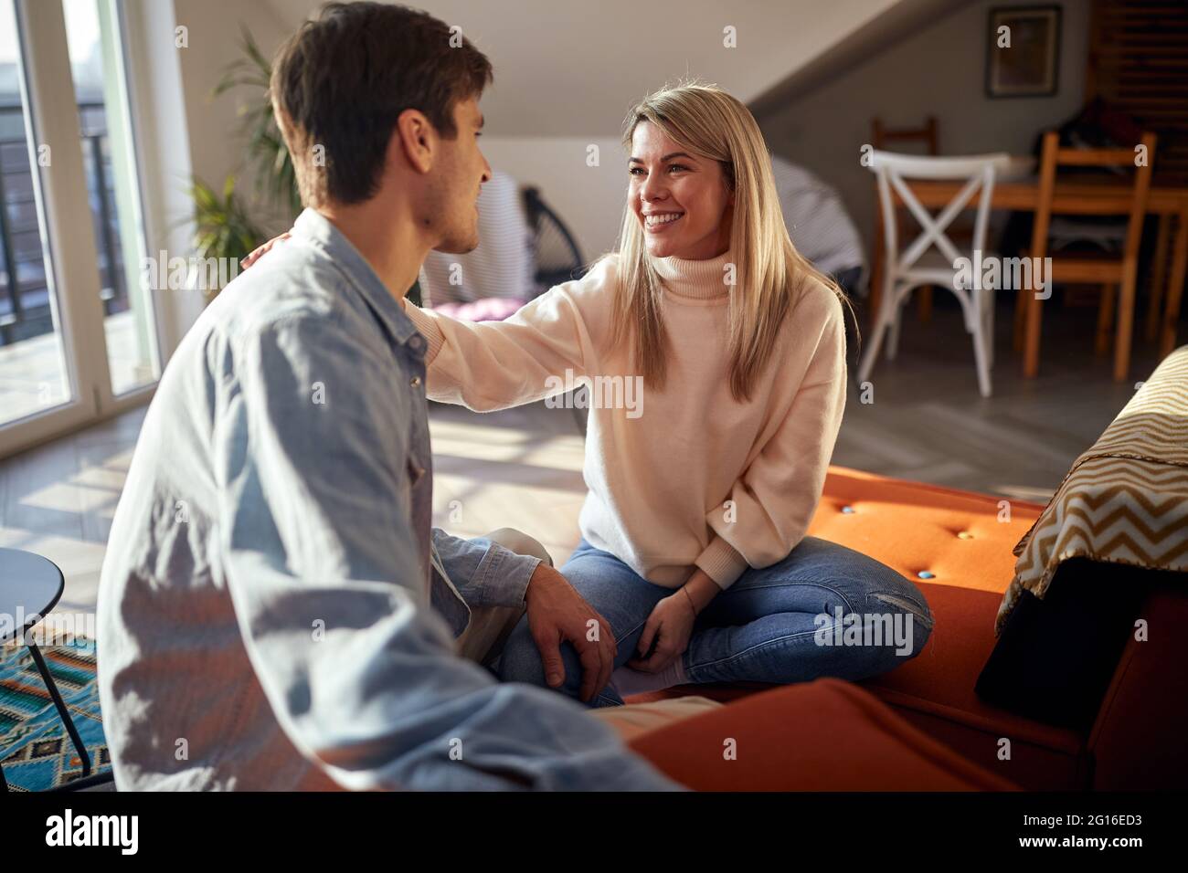 Young emotional caucasian spouses talking hi-res stock photography and ...