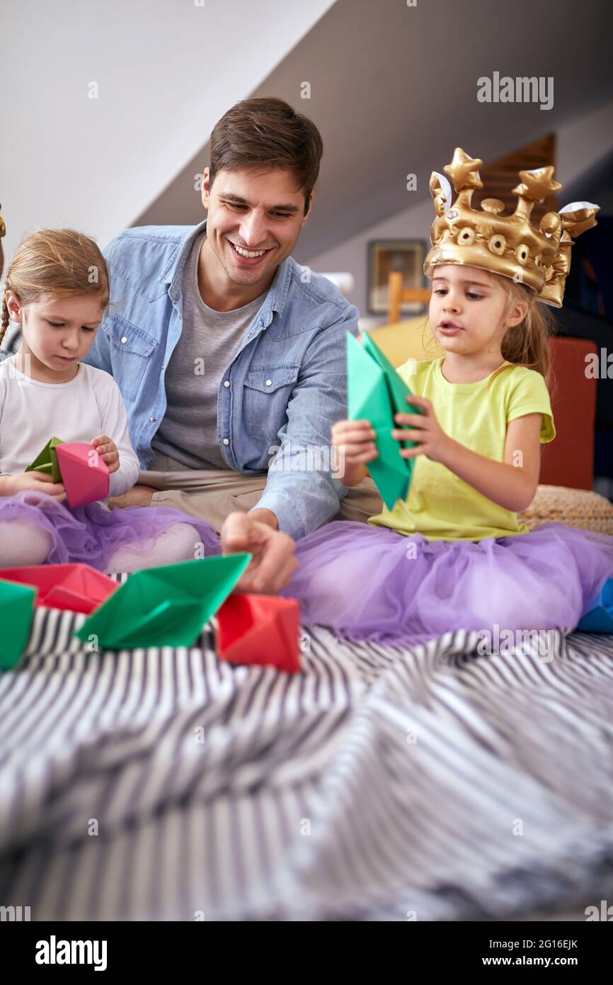 Kids playing paper boats hi-res stock photography and images - Alamy