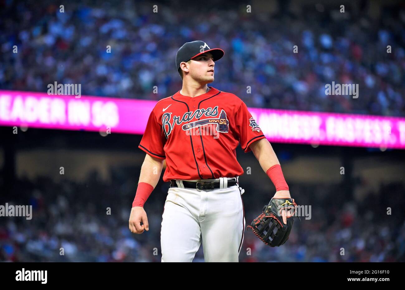 June 04, 2021: Atlanta Braves third baseman Austin Riley walks back to ...