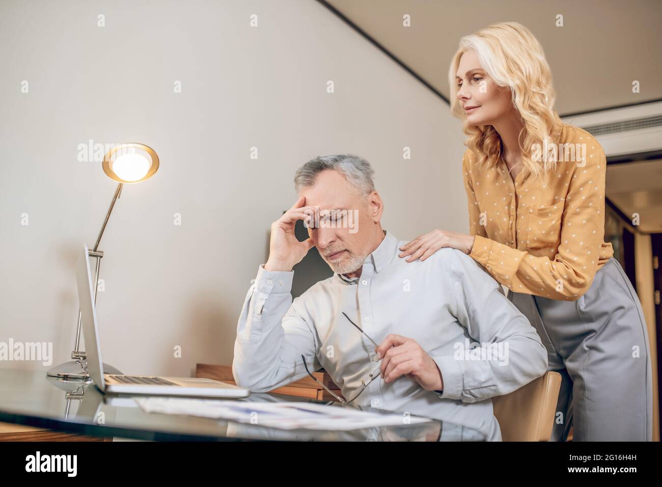 Woman supporting man hi-res stock photography and images - Alamy
