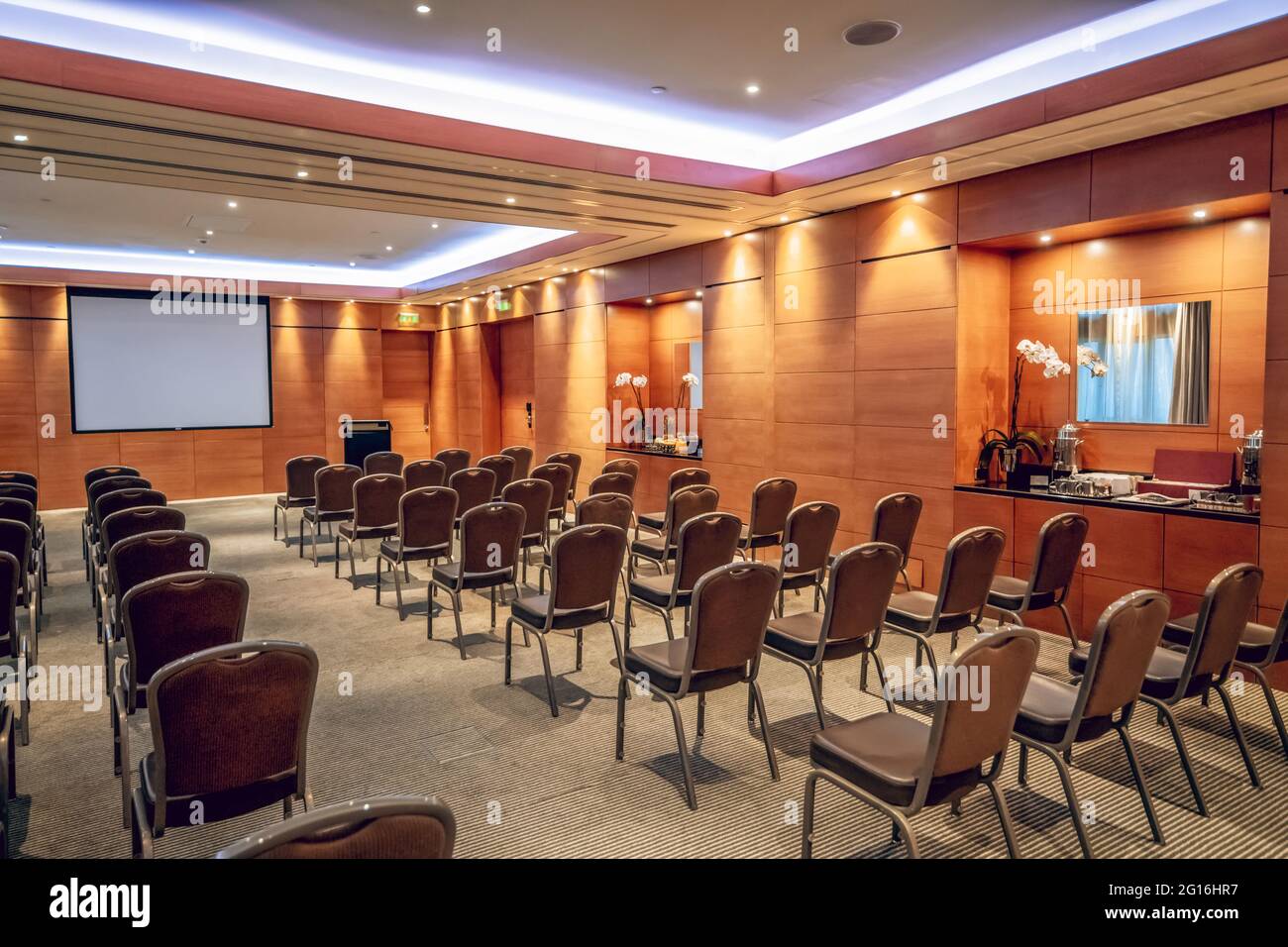 Conference room with nice furniture and floating ceiling Stock Photo ...