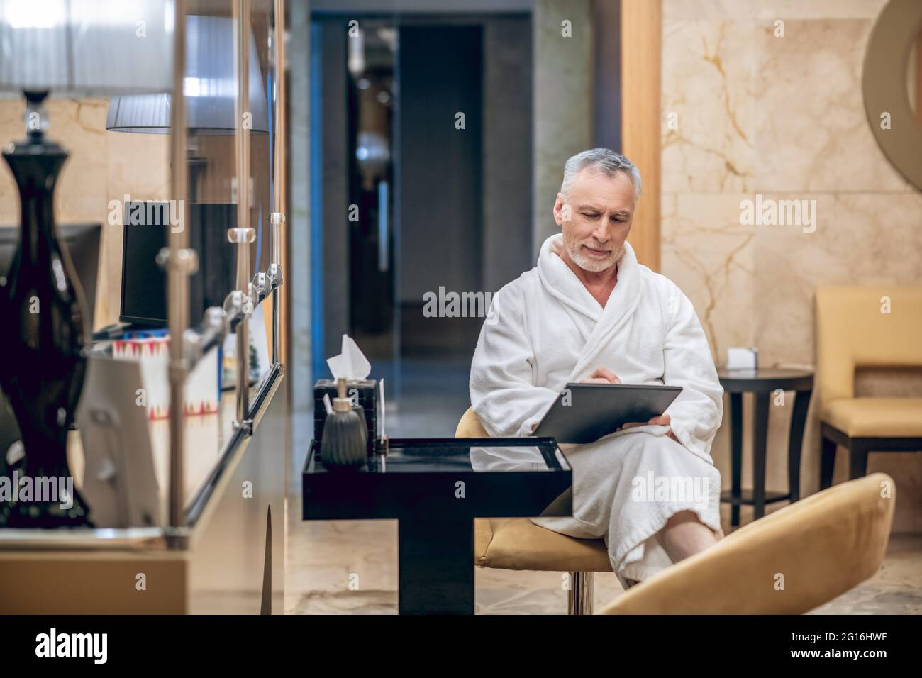 Man in a white robe hi-res stock photography and images - Alamy