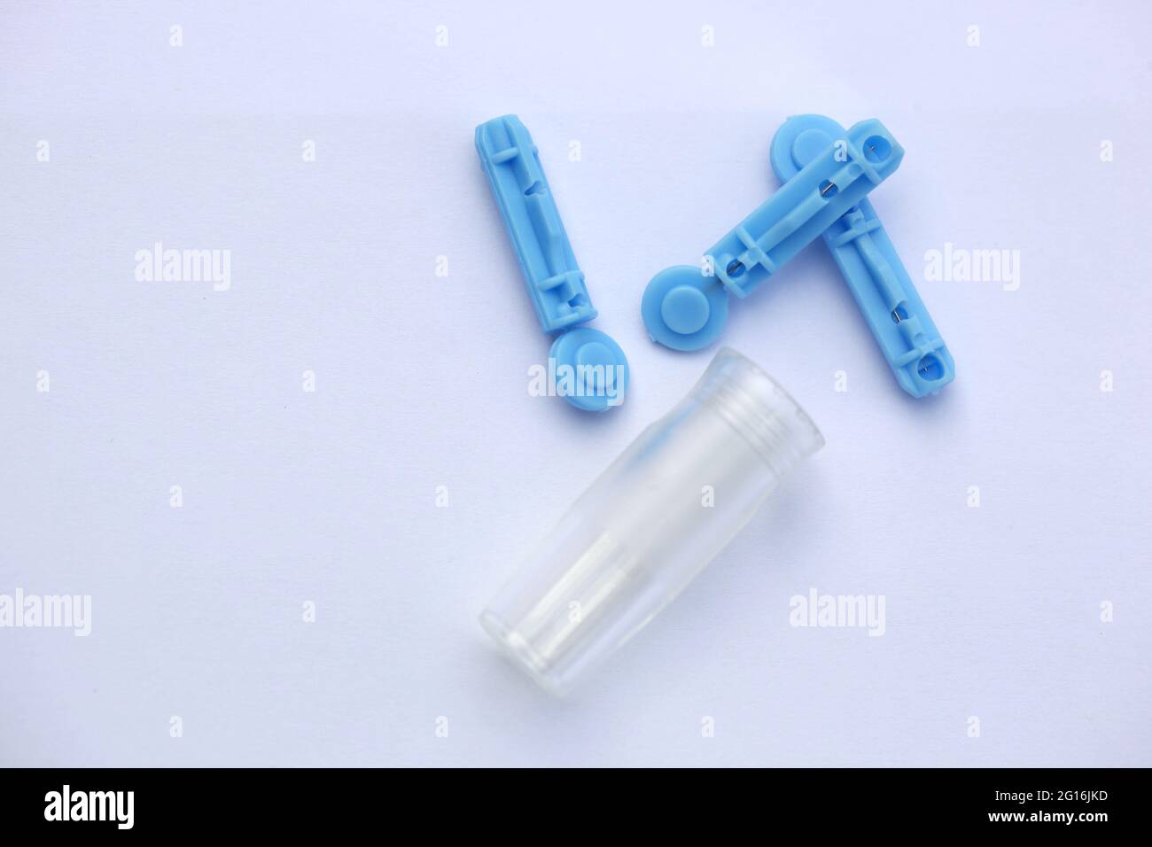 Healthcare & Medical - Close-up of blue Lancet Needles and plastic vial ...