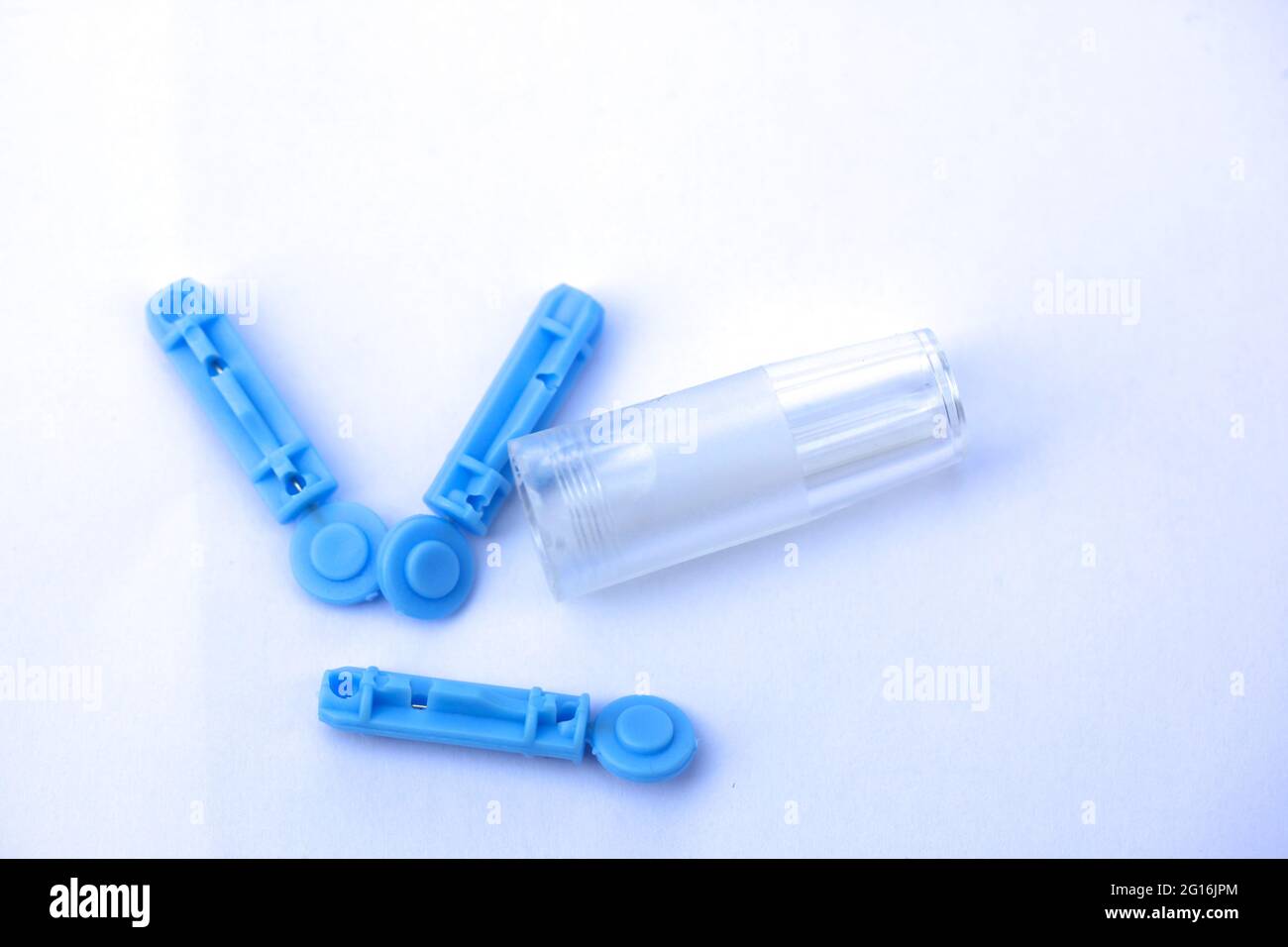 Healthcare & Medical - Close-up of blue Lancet Needles and plastic vial ...