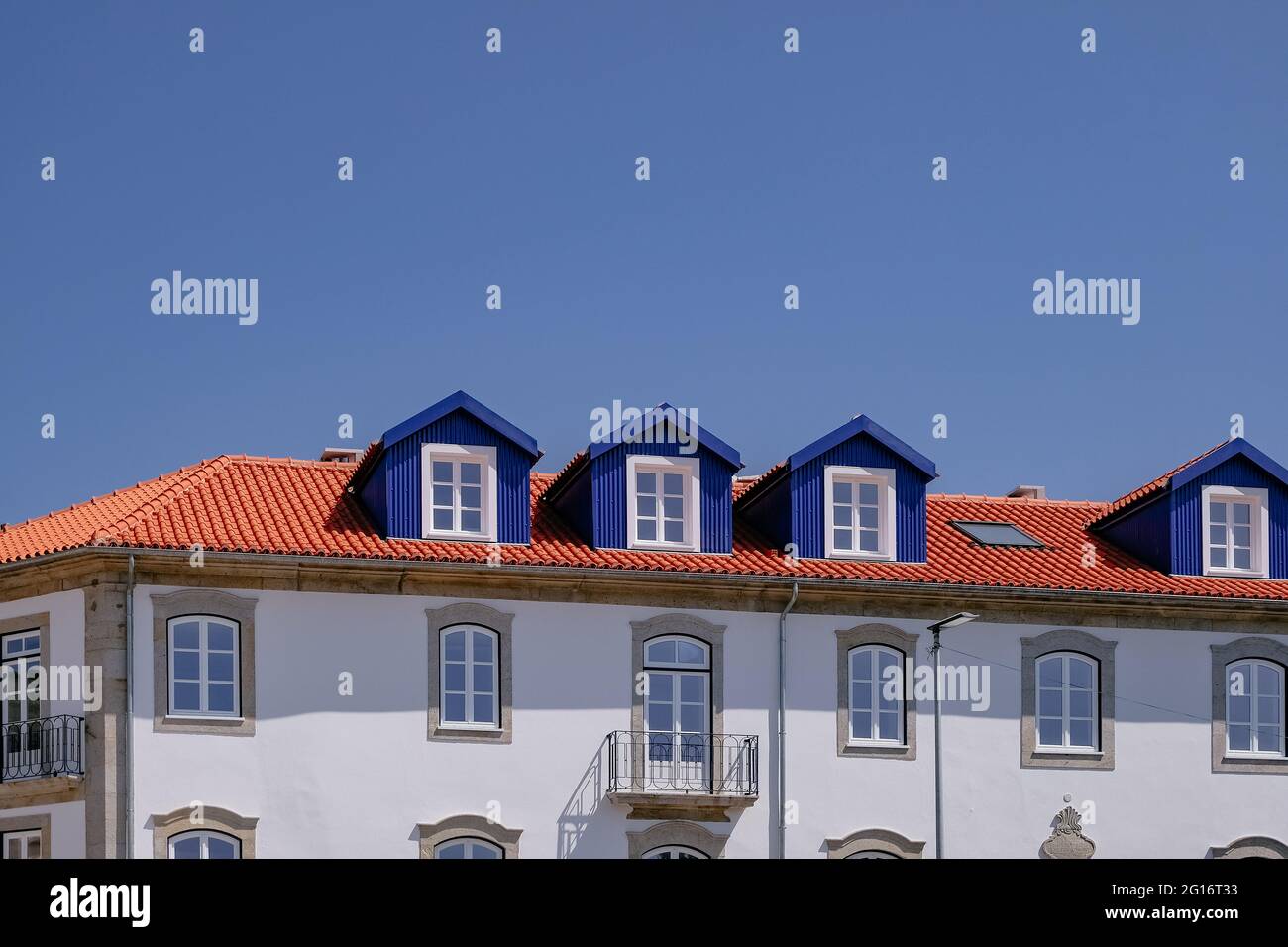Facade of Traditional House Building with Beautiful Windows and Orange ...
