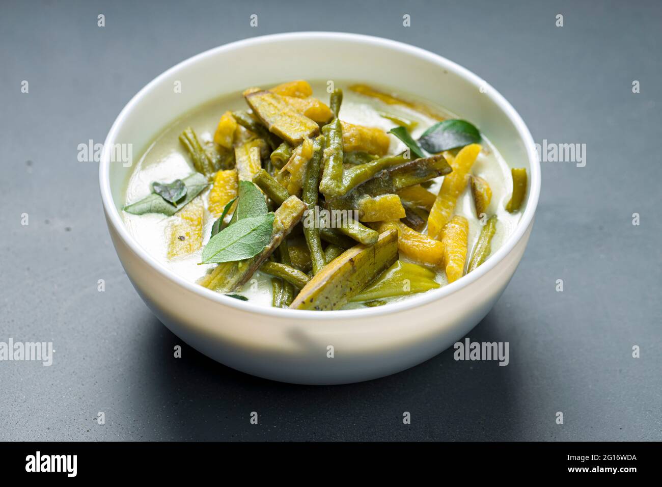Olan Kerala feast side dish, vegeterian food item made using raw banana ...