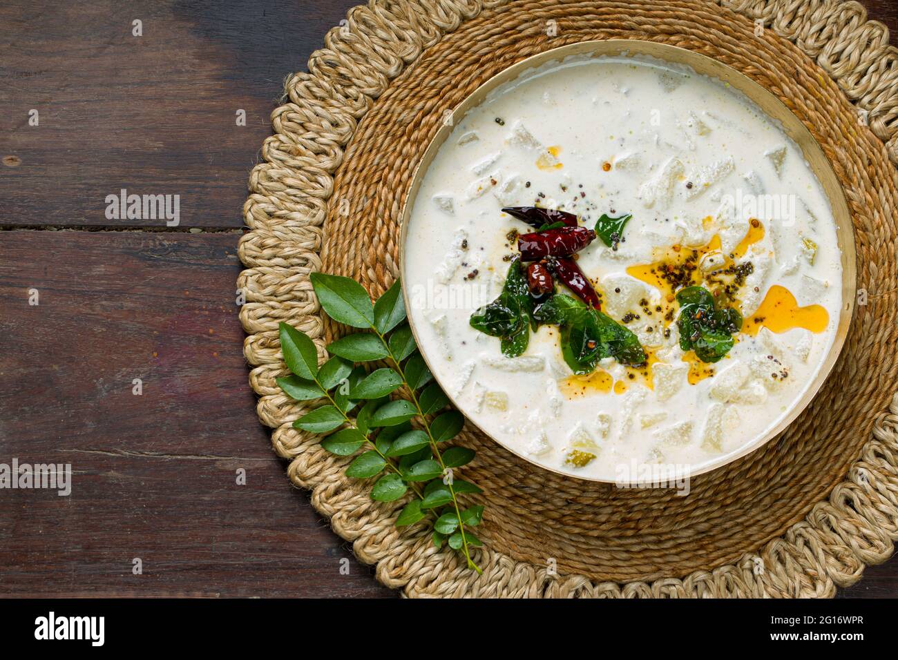 Pachadi or Raitha south Indian side dish made using ash guard, curd and ...