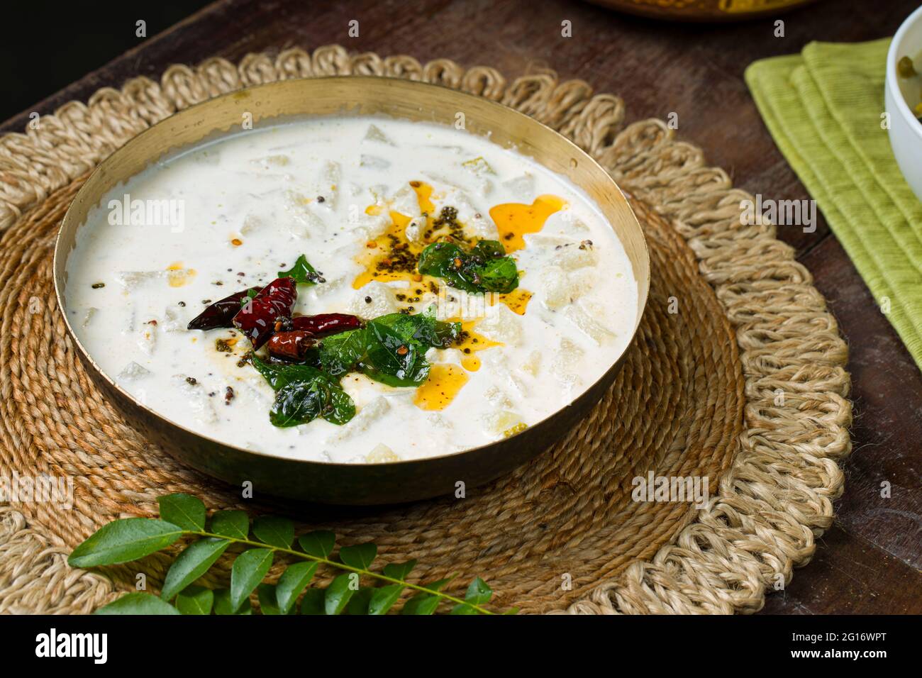 Pachadi or Raitha south Indian side dish made using ash guard, curd and ...
