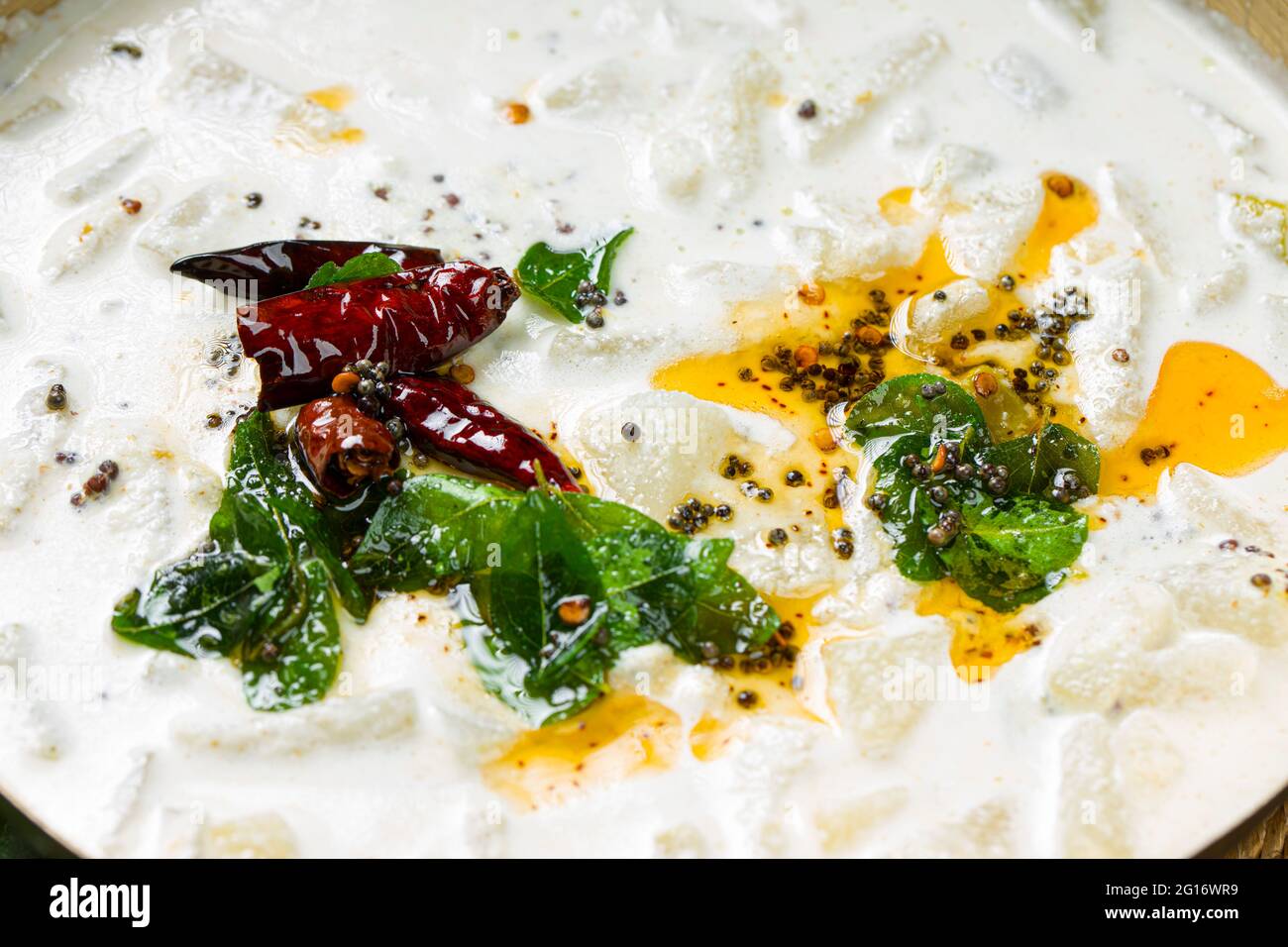 Pachadi or Raitha south Indian side dish made using ash guard, curd and ...