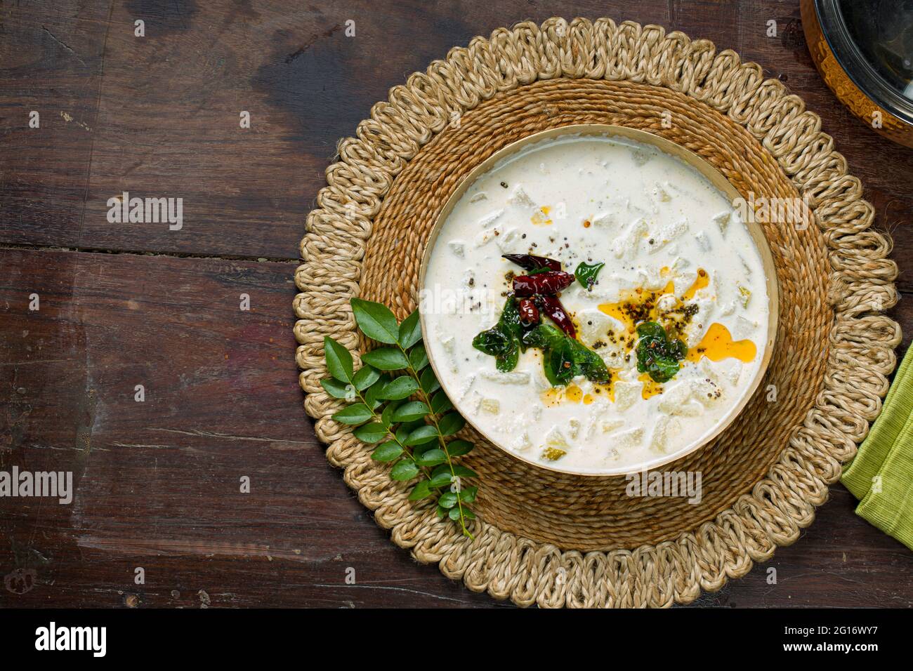 Pachadi or Raitha south Indian side dish made using ash guard, curd and ...