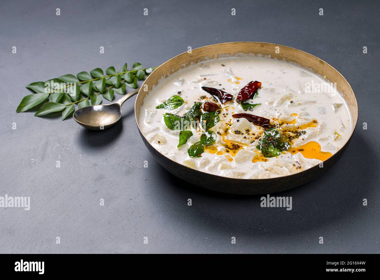 Pachadi or Raitha south Indian side dish made using ash guard, curd and ...