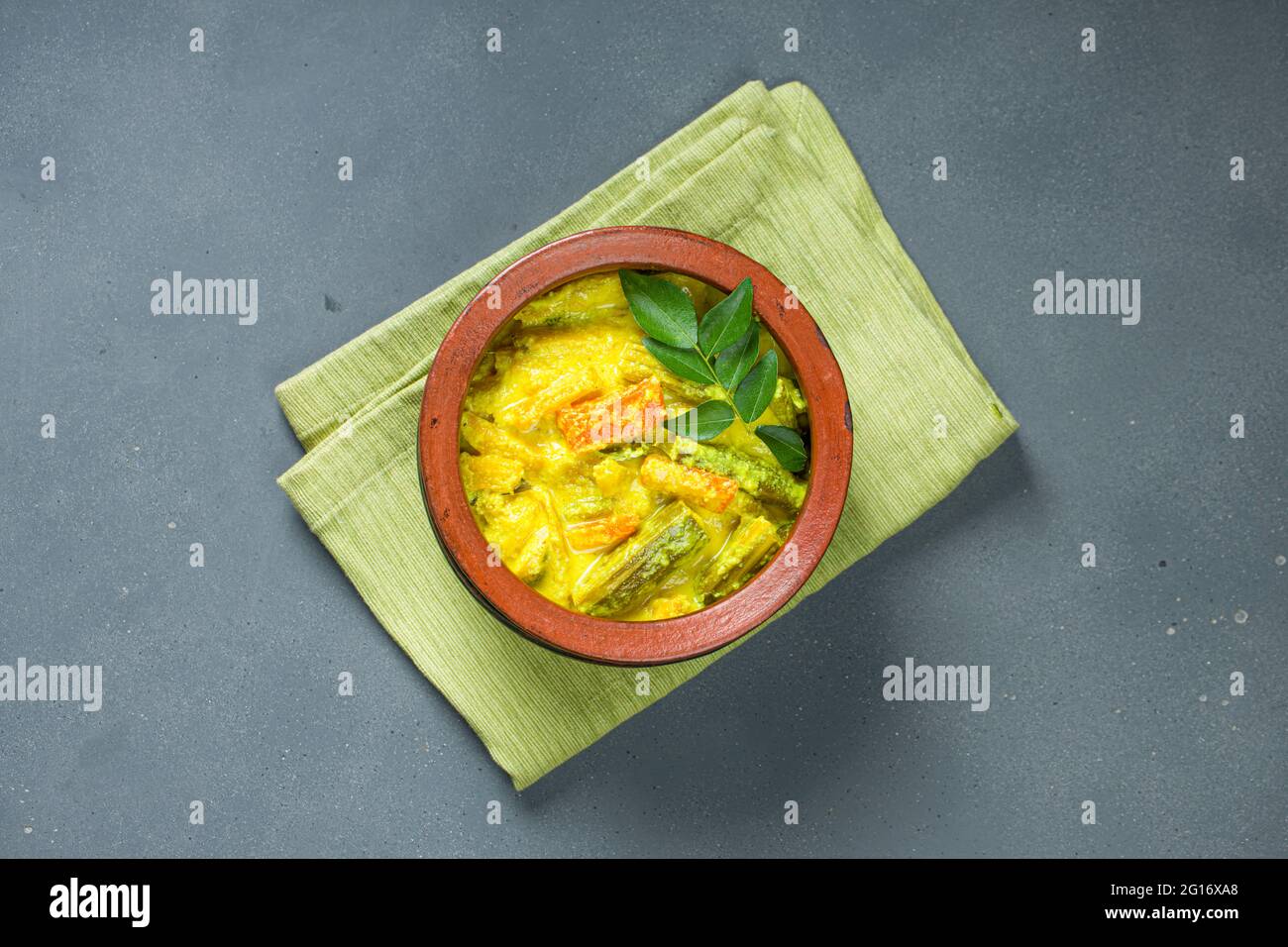 Avial Kerala traditional side dish, made using mixed vegetables and it ...