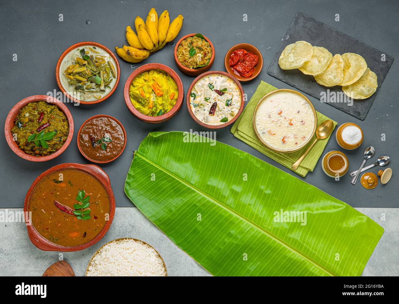 Kerala traditional feast side dishes arranged in a two colour ...