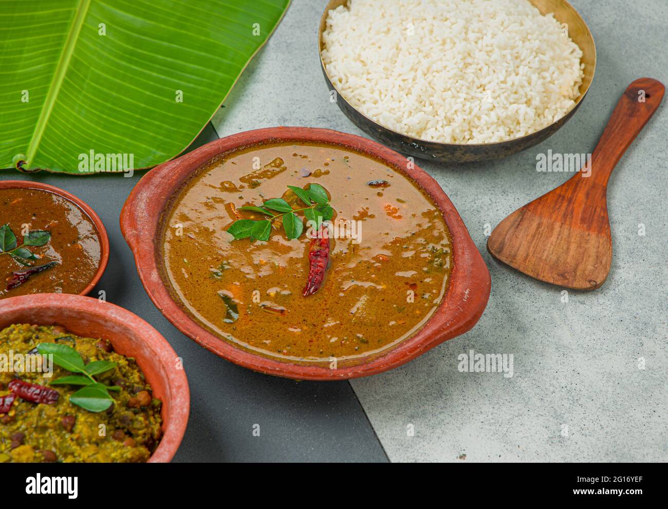 Kerala traditional feast side dishes and rice arranged in two colour ...