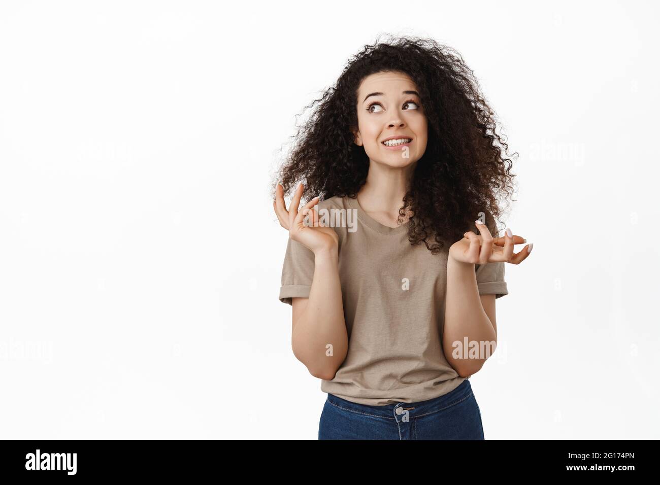 Oops my silly mistake. cute awkward curly girl shrugging shoulders ...