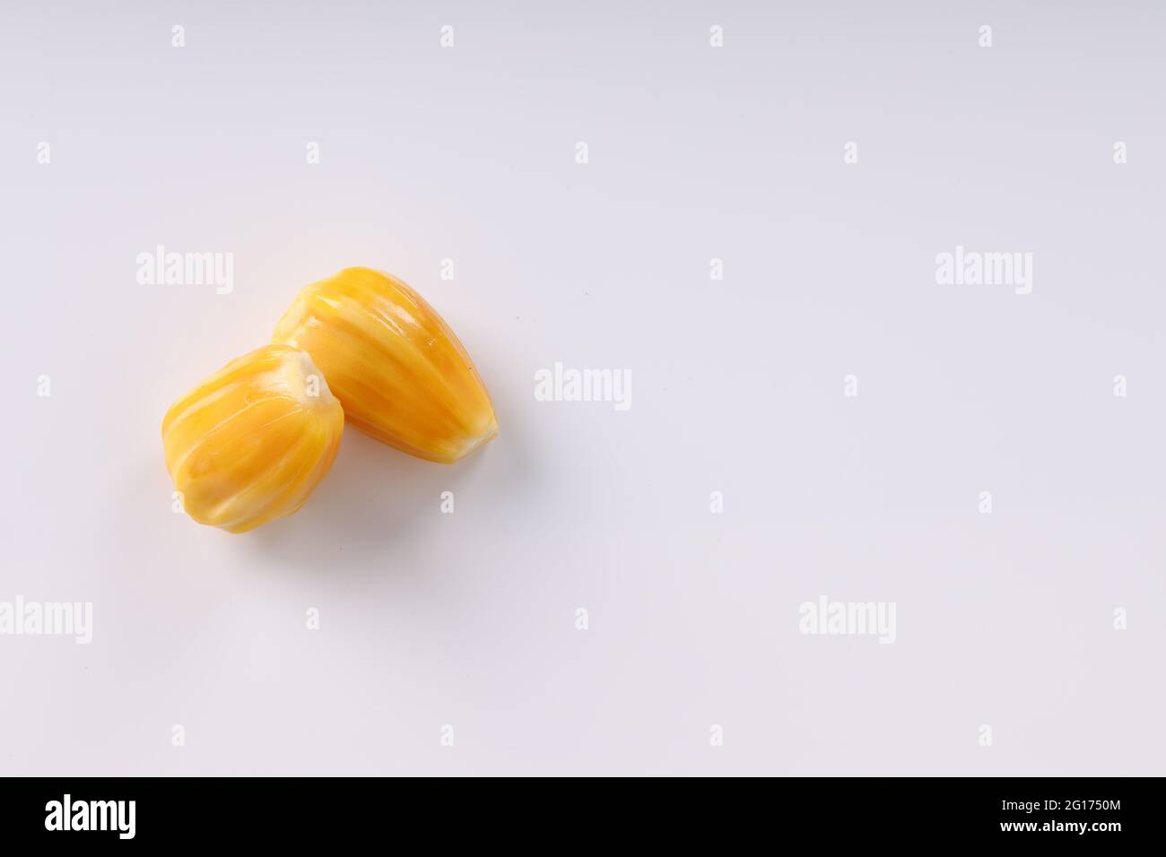 Ripe Jackfruit arranged beautifully in a white textured background ...