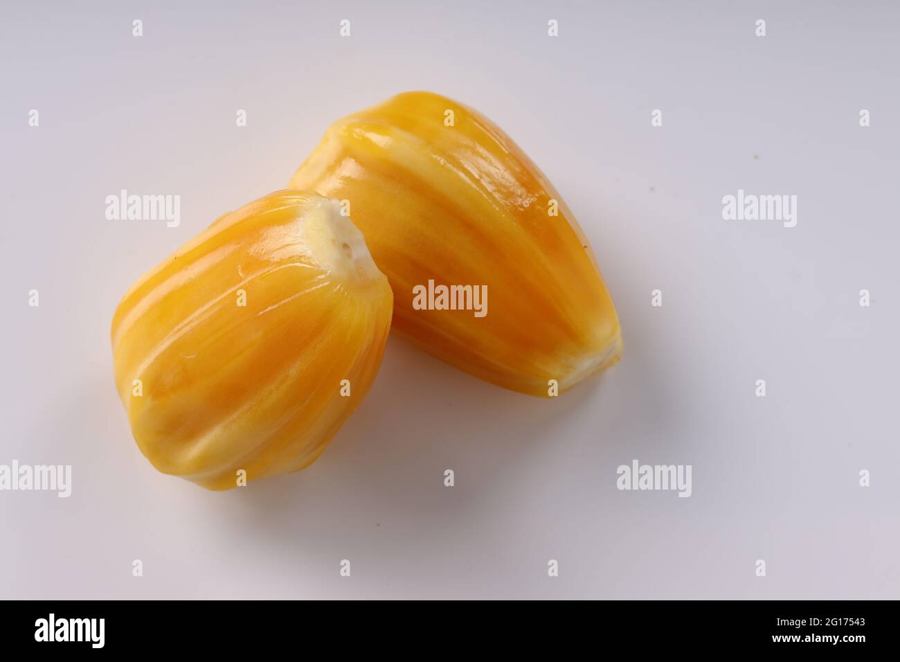 Ripe Jackfruit arranged beautifully in a white textured background ...