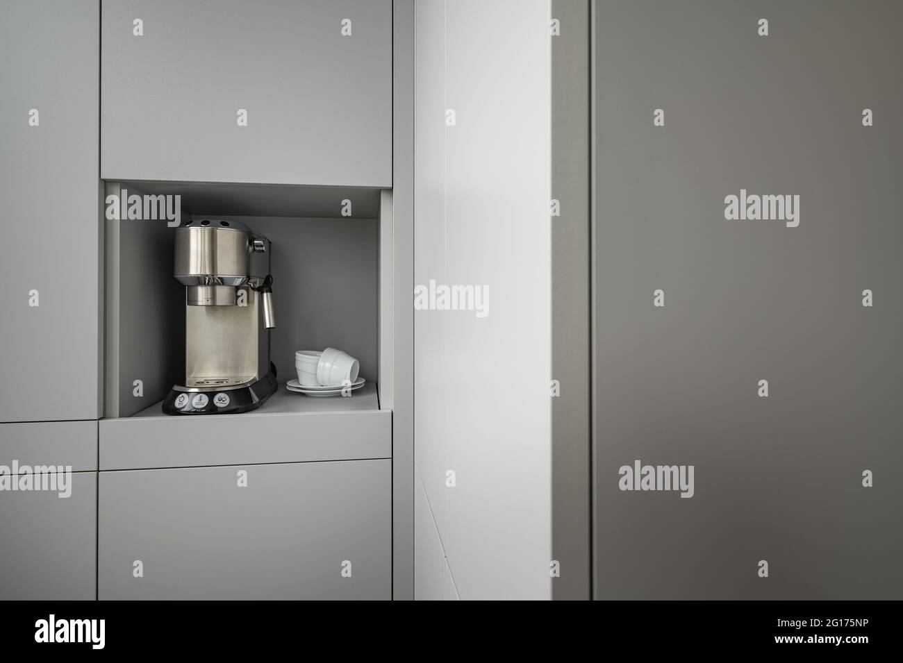 Modern gray kitchen corner with espresso coffee machine Stock Photo - Alamy