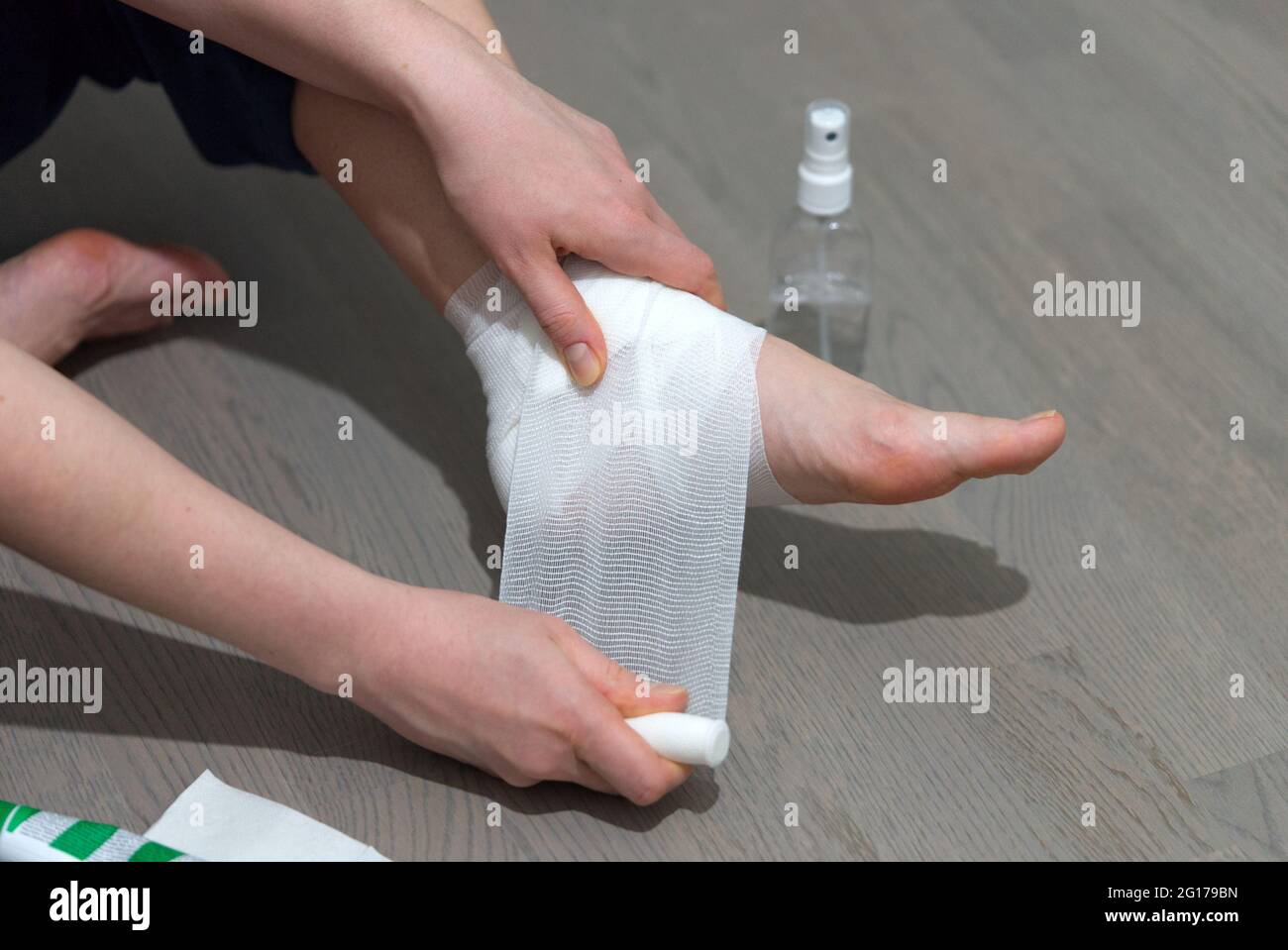 callus on leg. Girl uses ointment, Band-Aid and bandage to treat ...