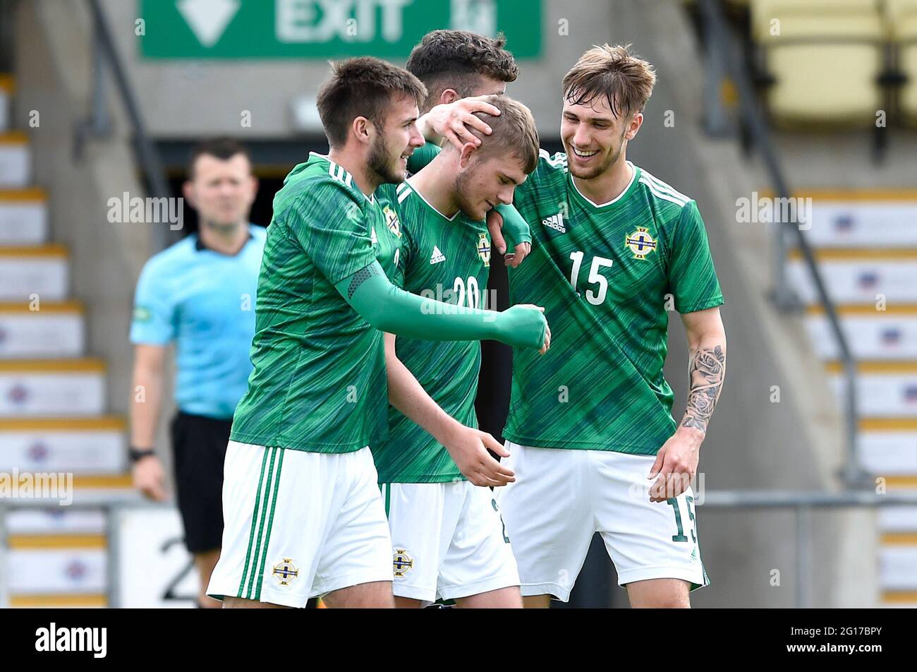 Northern Ireland's Ryan Waide (centre) celebrates scoring their side's ...