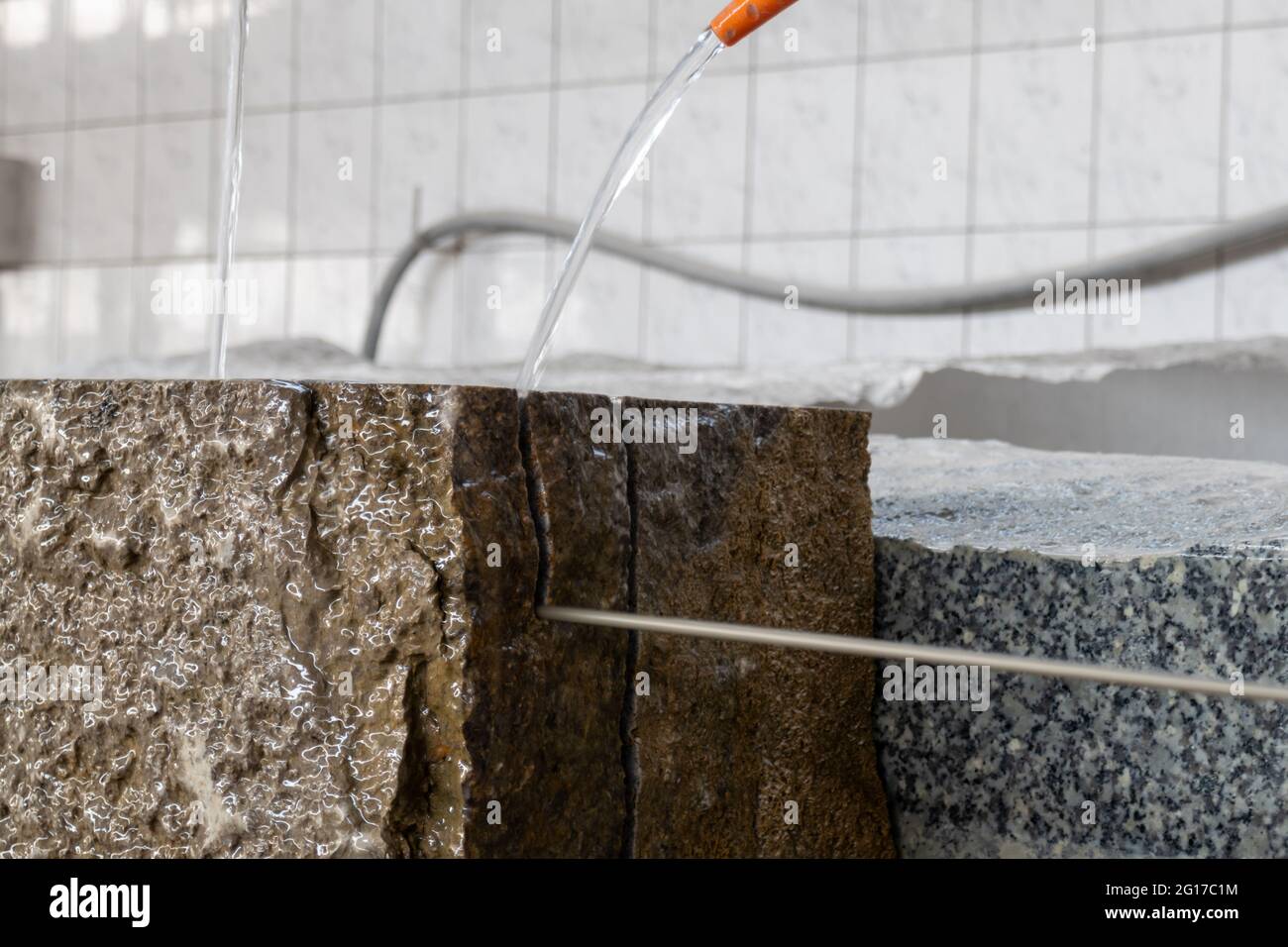 Stone wire saw. Machine for cutting granite stones. Cutting granite in ...