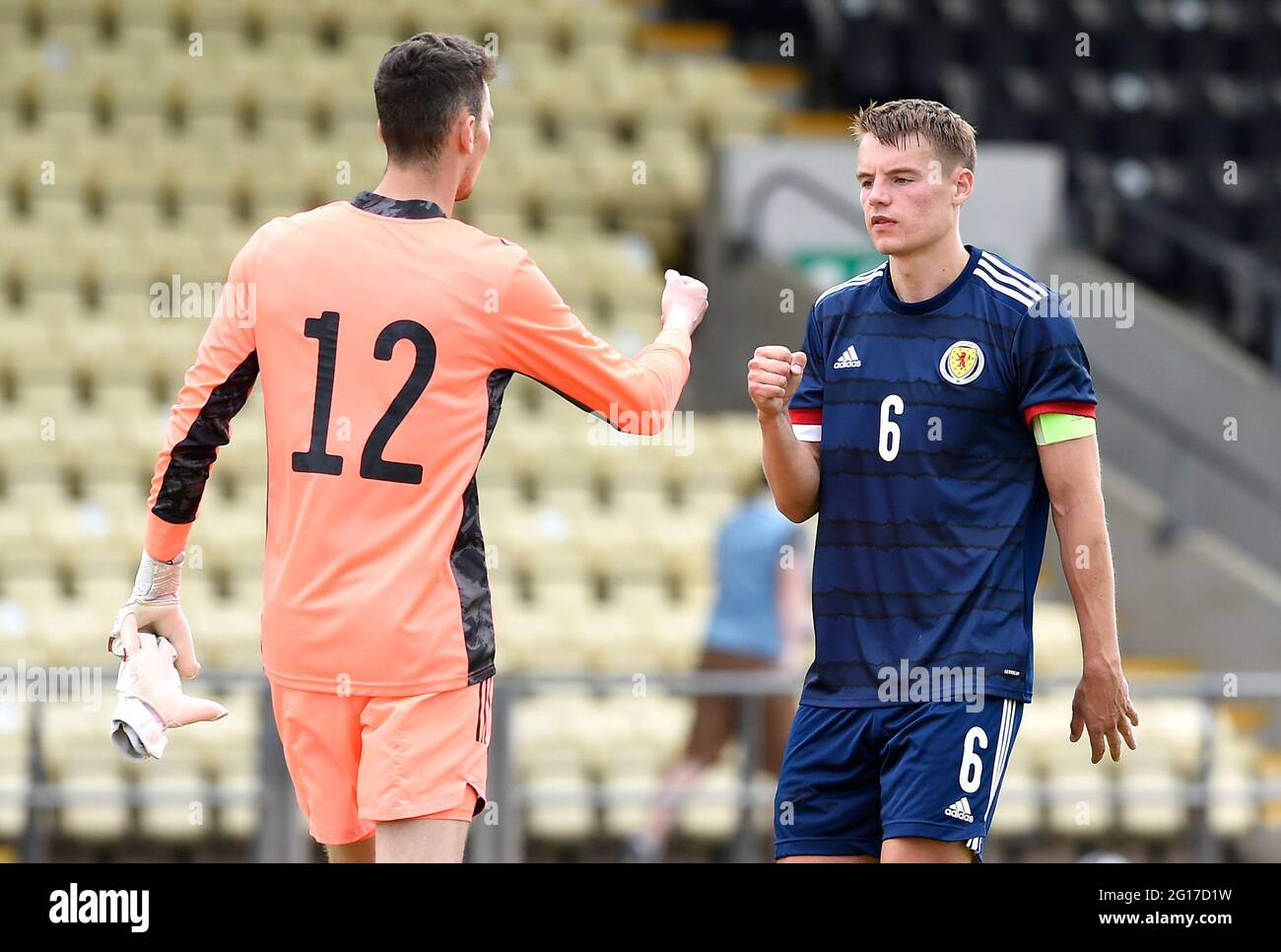 Northern Ireland goalkeeper David Walsh (left) and Scotland's Lewis ...