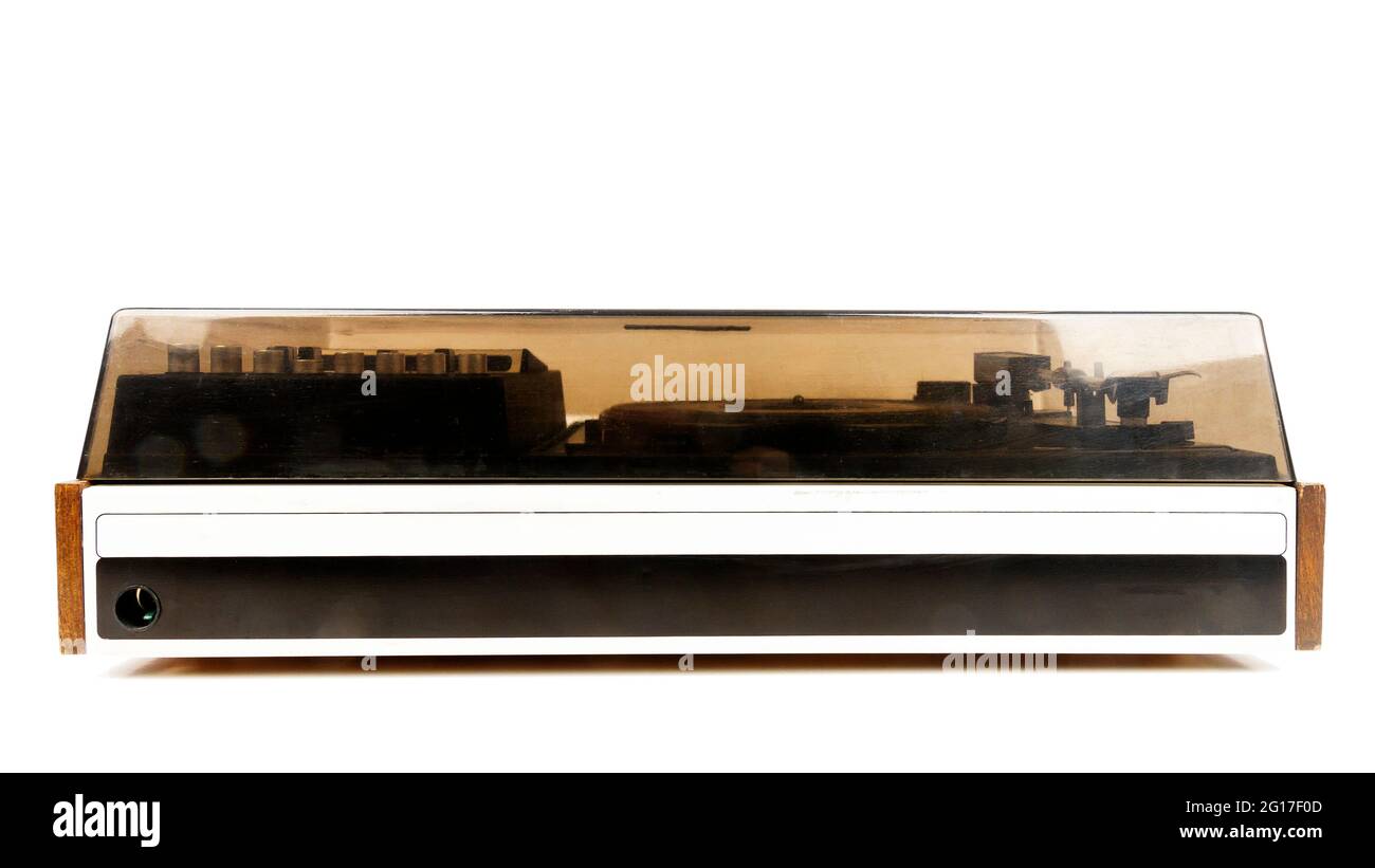 Vintage turntable vinyl record player with dust cover isolated on white ...