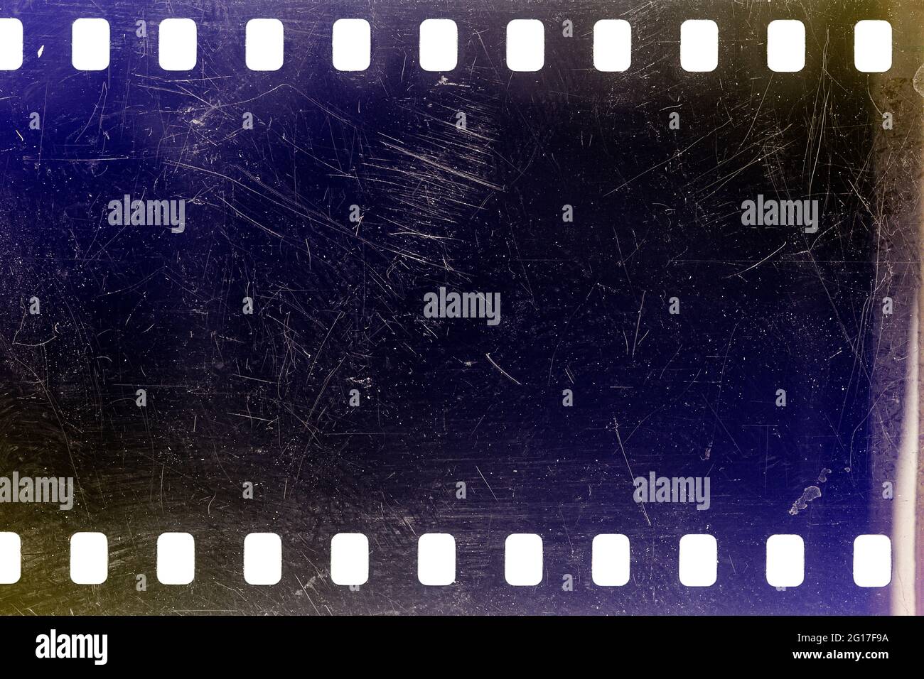 Dusty and grungy 35mm film texture or surface. Perforated camera film ...