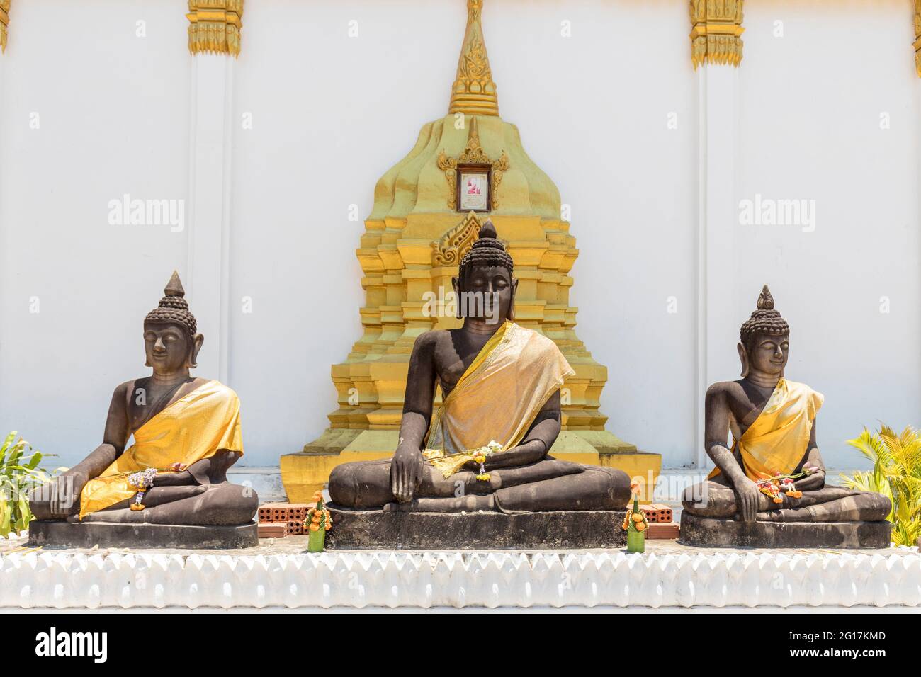 Black buddha with golden sash, Wat Luang Pakse, temple in Pakse, Laos ...