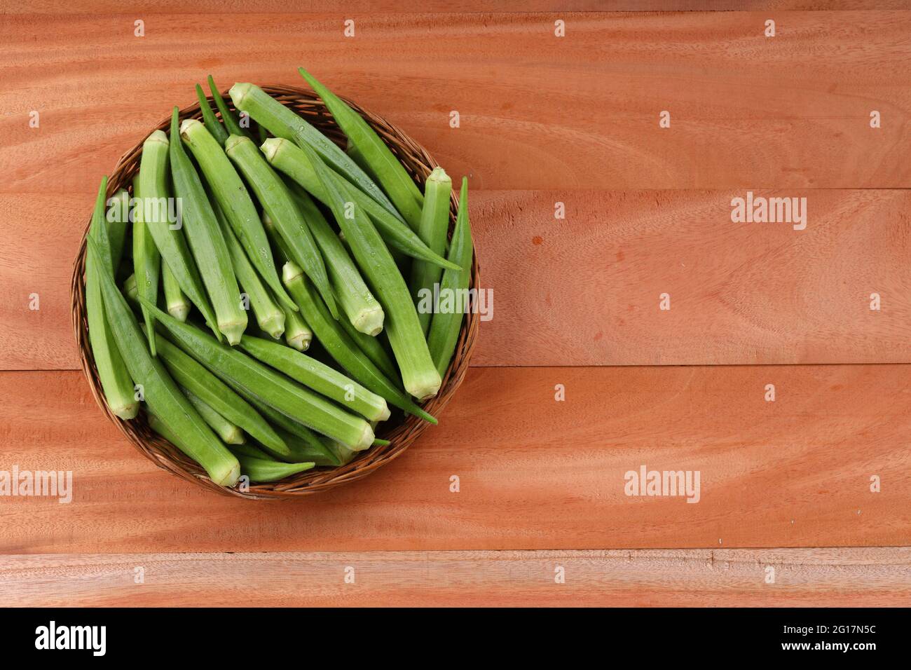 Okra in basket hi-res stock photography and images - Alamy