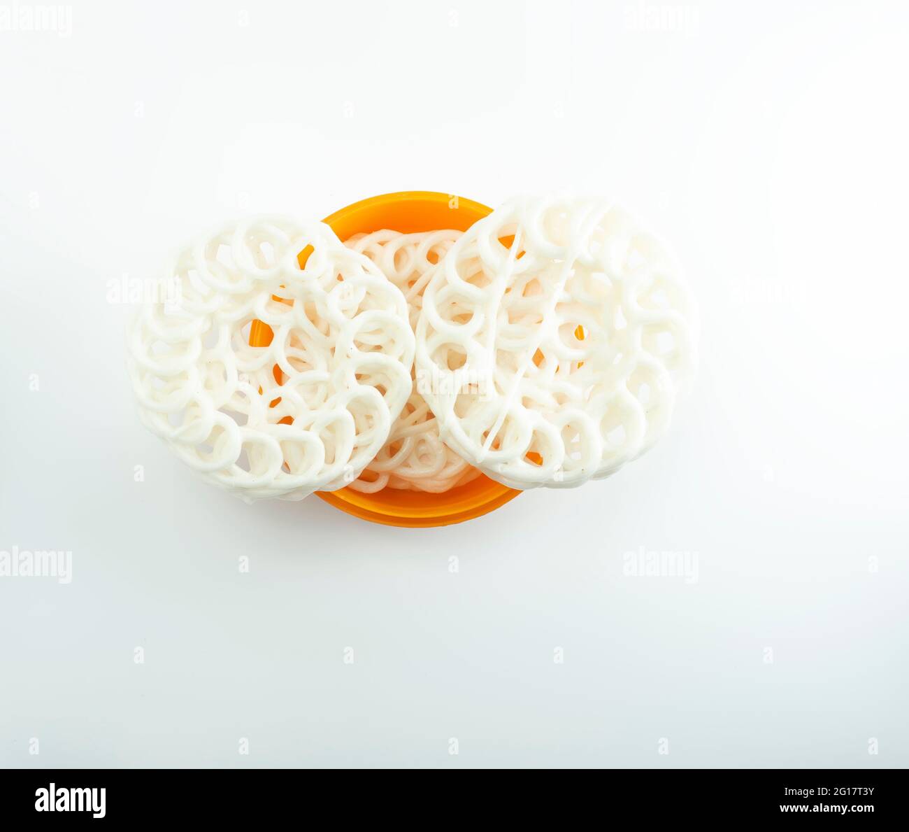 Krupuk or Kerupuk, traditional Indonesian crackers, placed in an orange ...