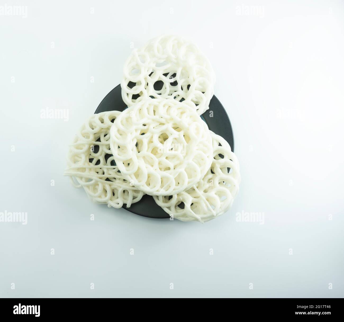 Krupuk or Kerupuk, Indonesian traditional crackers, placed in a green ...