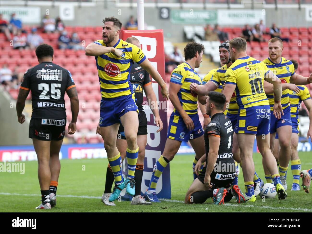 Warrington wolves toby king celebrates scoring hi-res stock photography ...