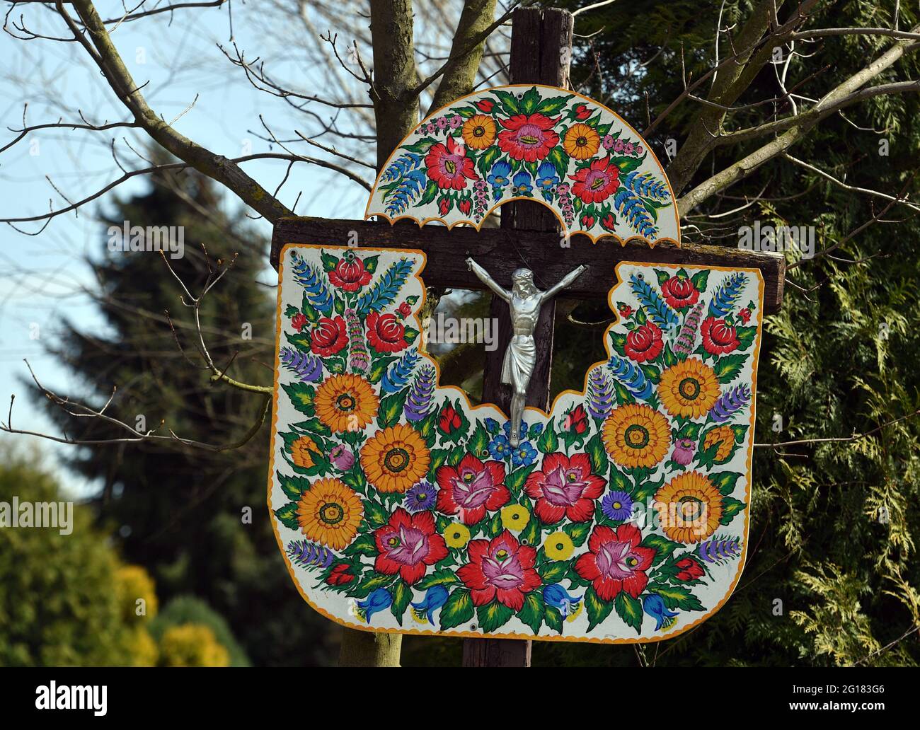 A roadside cross decorated with a floral pattern.The village of Zalipie ...