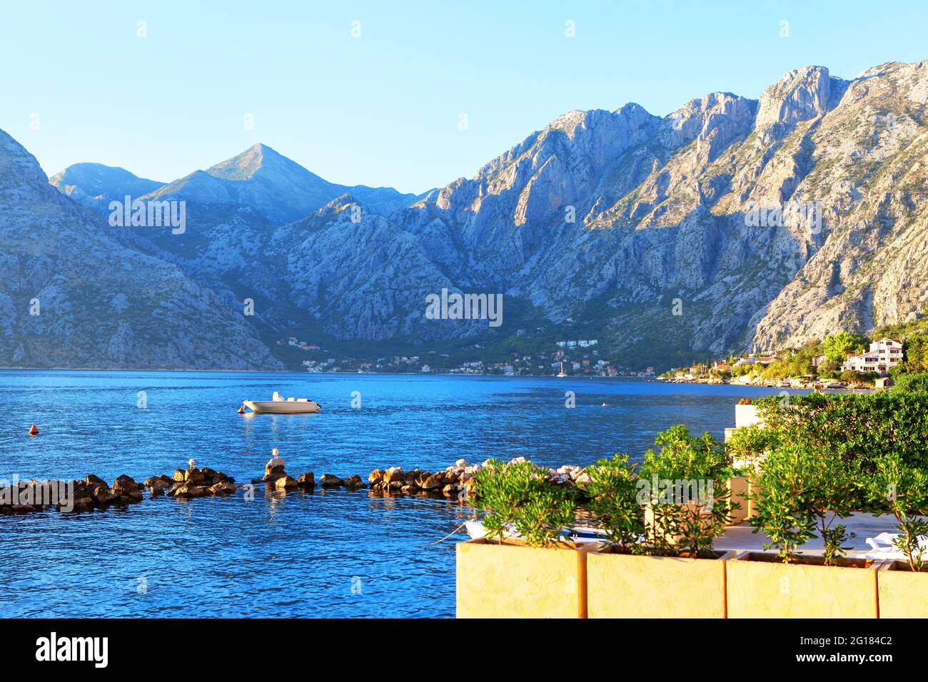 Coastal Terrace with Harbor . Coastal Getaways Surrounded by Mountains ...