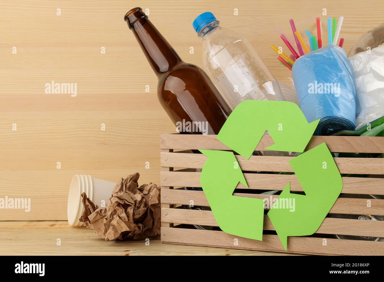 Eco symbol and trash in the box. recycling. waste recycling. on natural ...