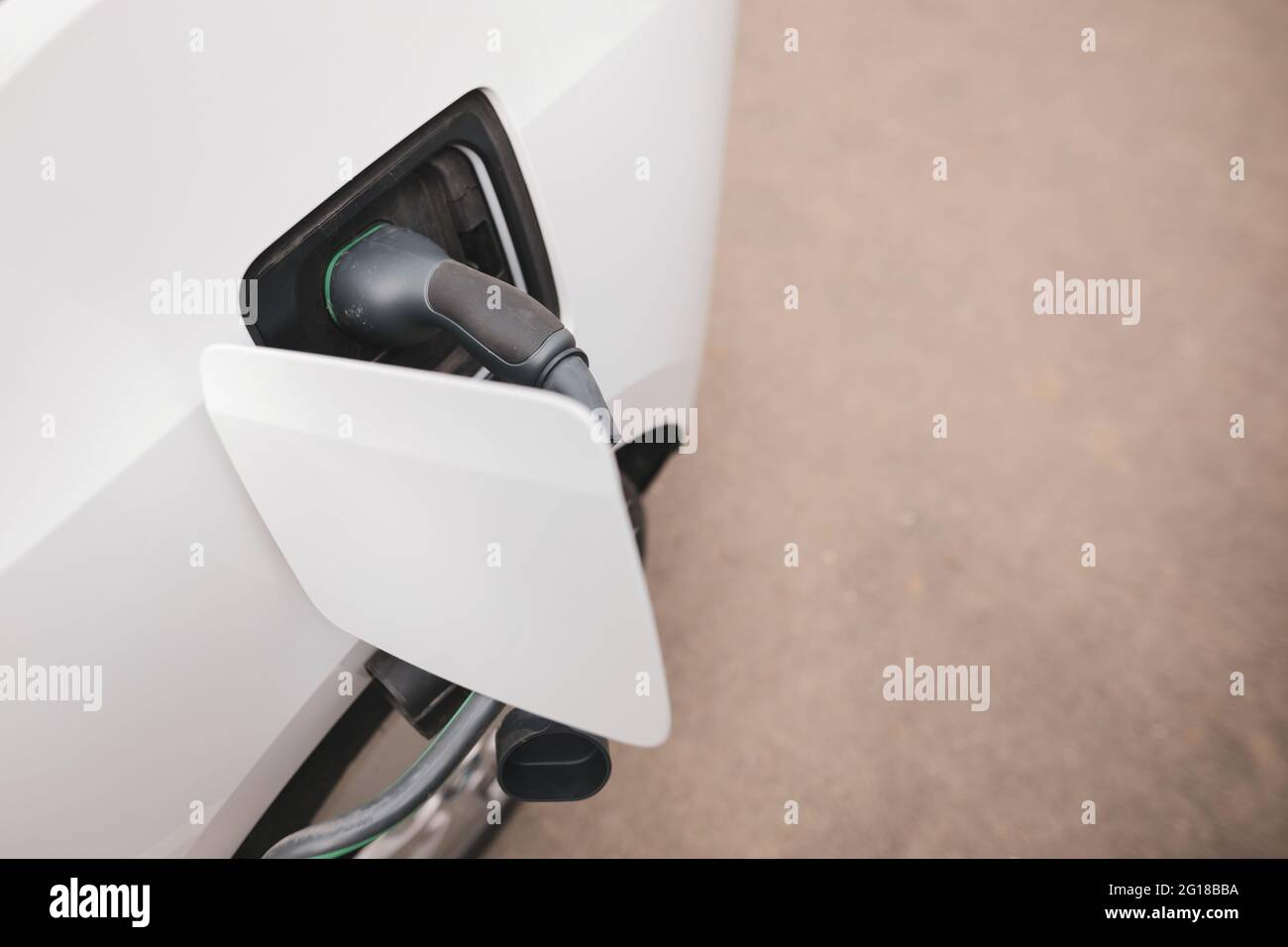 Shallow depth of field (selective focus) image with an electric car ...