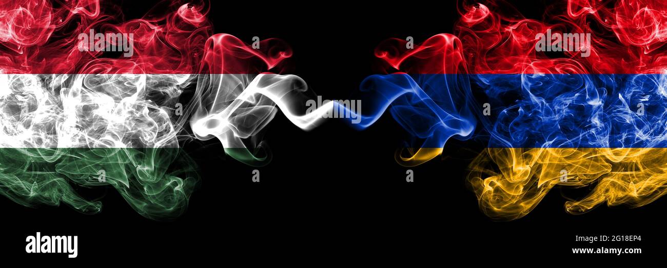 Hungary, Hungarian vs Armenia, Armenian smoky flags side by side Stock ...