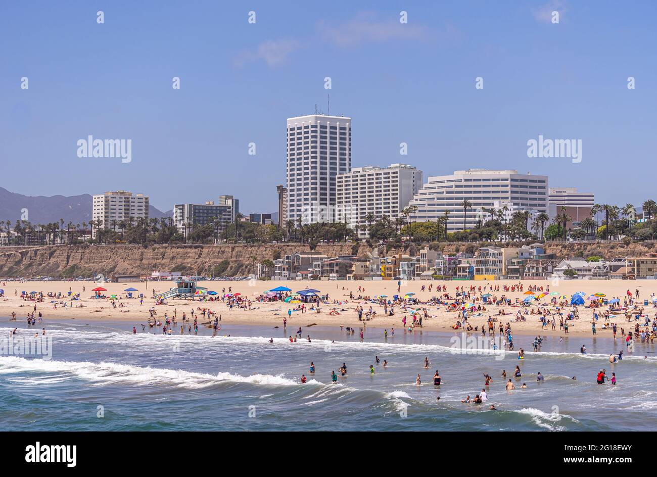 Santa Monica, CA, USA - June 20, 2013: Beach and surf full of bathers ...