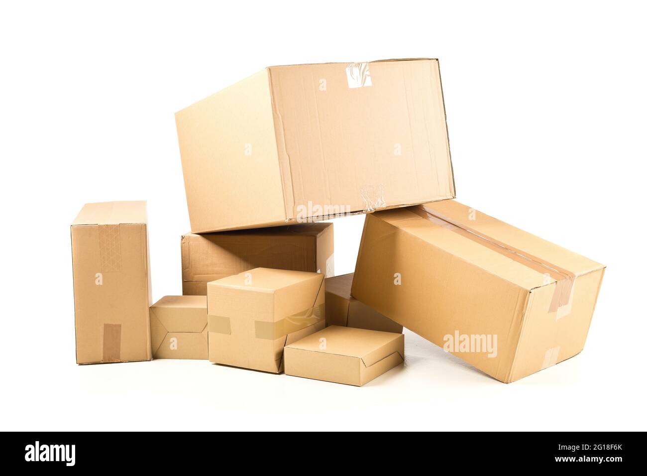 Stack or heap of brown carton cardboard boxes over white background ...
