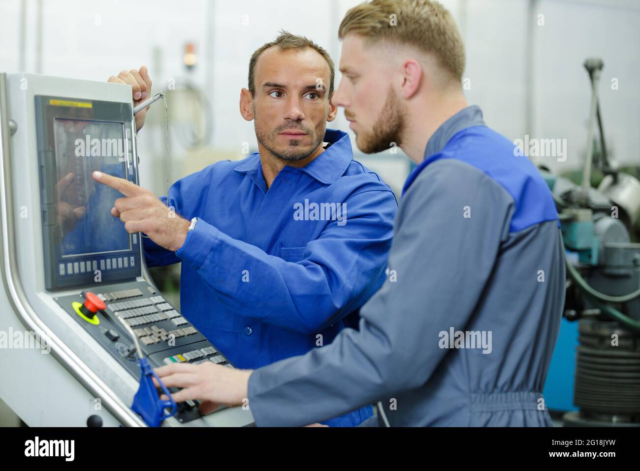 male technological factory machine operators Stock Photo - Alamy