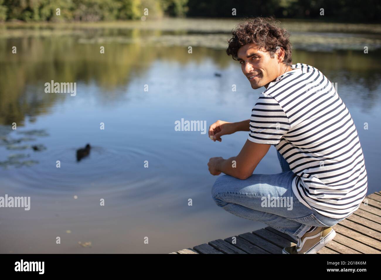 Man crouched rear view hi-res stock photography and images - Alamy