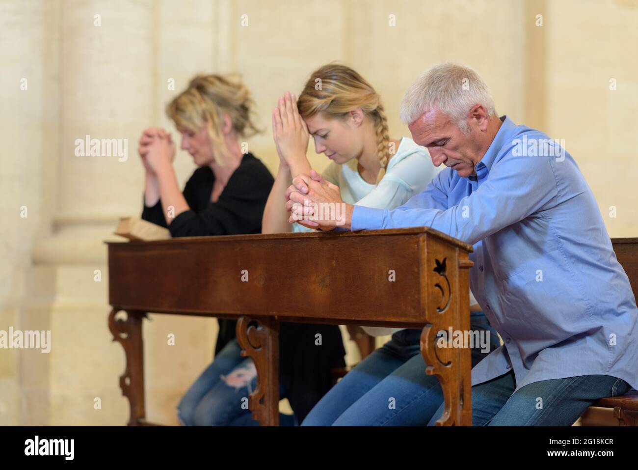 woman praying in the church Stock Photo - Alamy