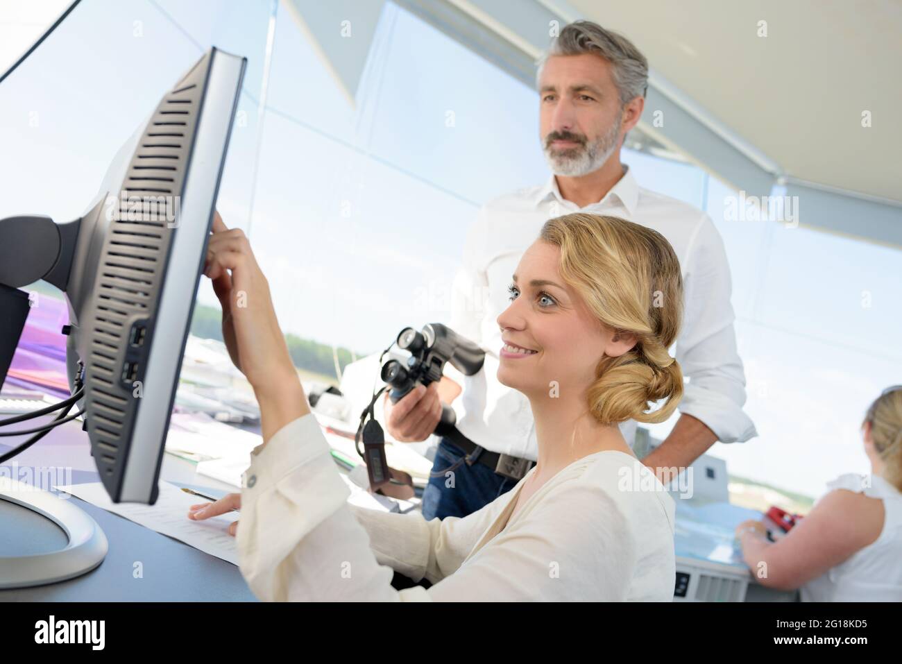 a female tower controller concept Stock Photo - Alamy